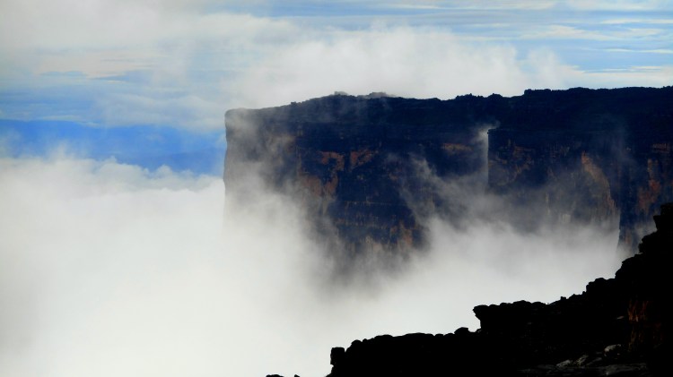 Above the clouds. The tepuys here have been described as “Islands in ...